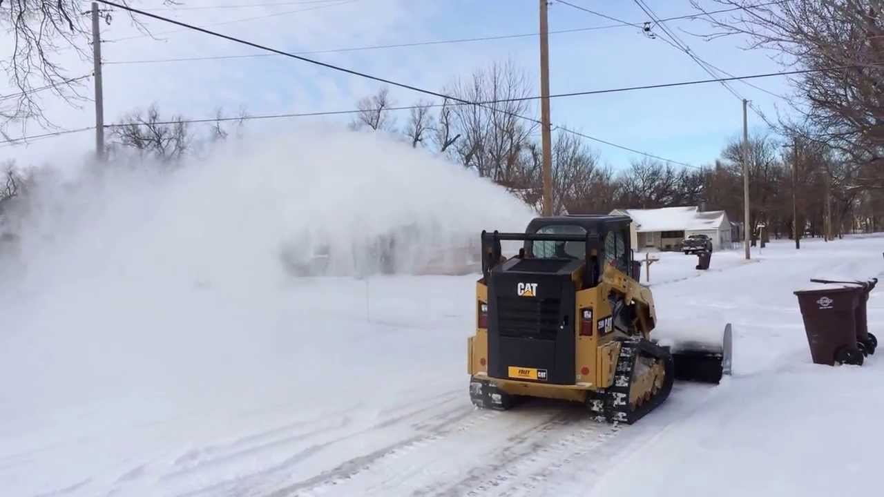Cat 259d On Tracks Throwing Snow Clearing The Streets Youtube