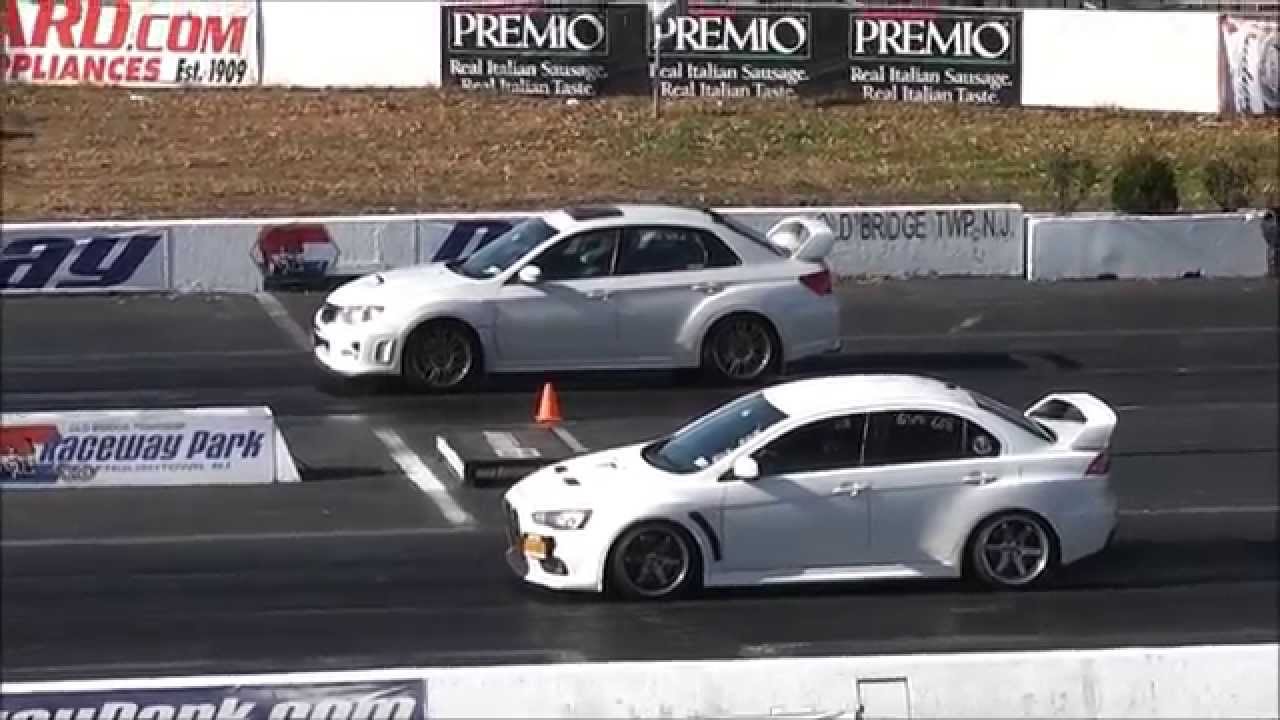 Street Wars Subaru Sti Vs Evo Mitsubishi Youtube