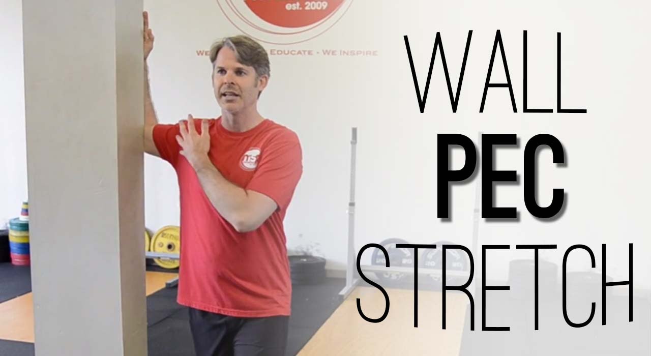 Chest Stretch On Wall Down Dog Variation At The Wall And Assisted