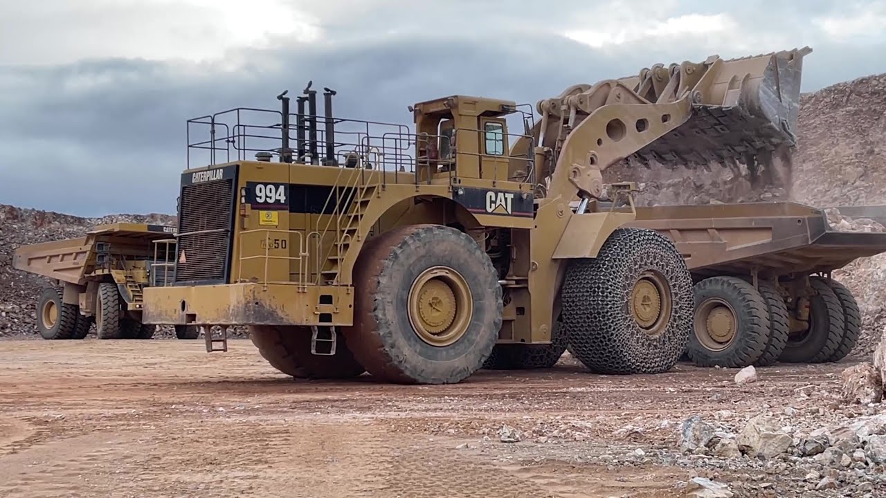 Huge Caterpillar 994 Wheel Loader Loading Caterpillar 777f Dumpers