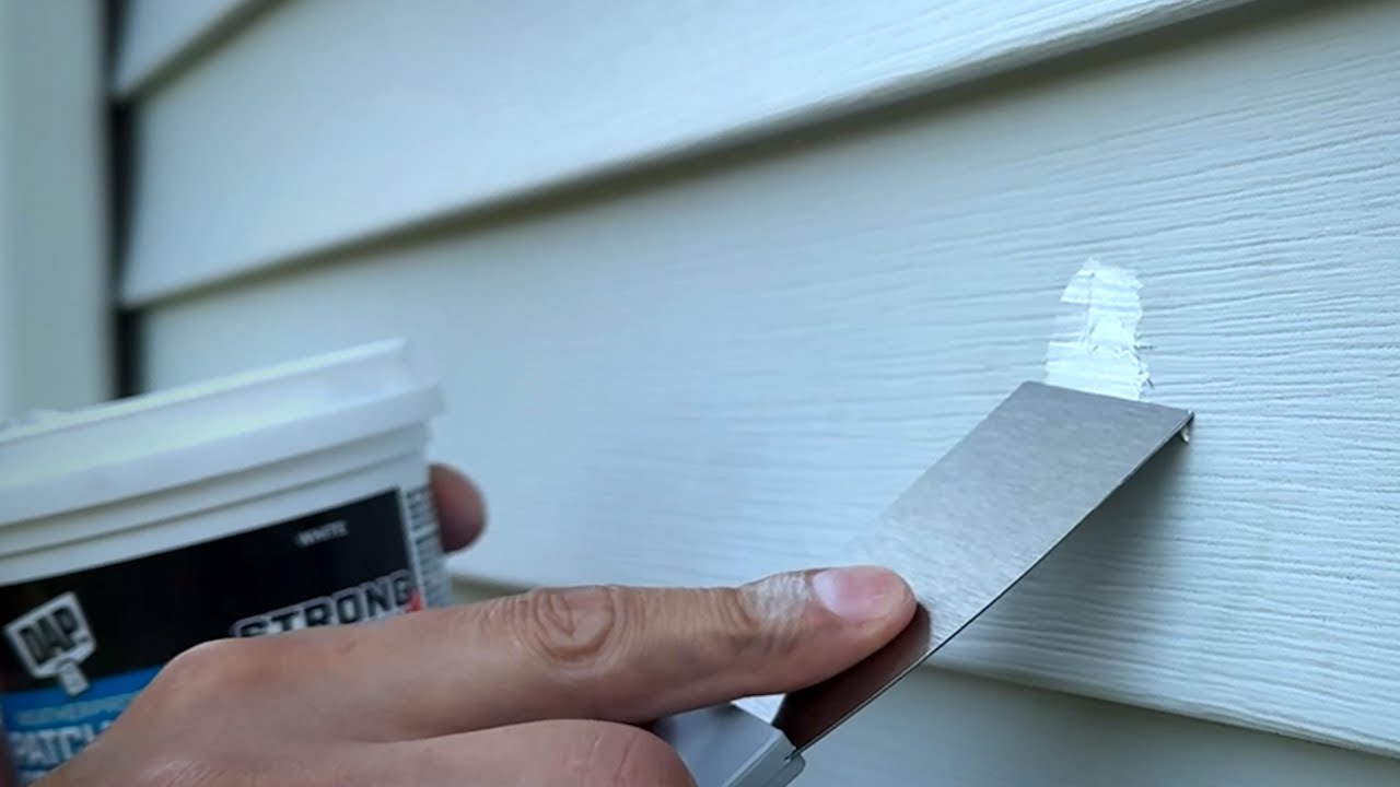 Using Patching Compound To Repair Siding Cracks Youtube
