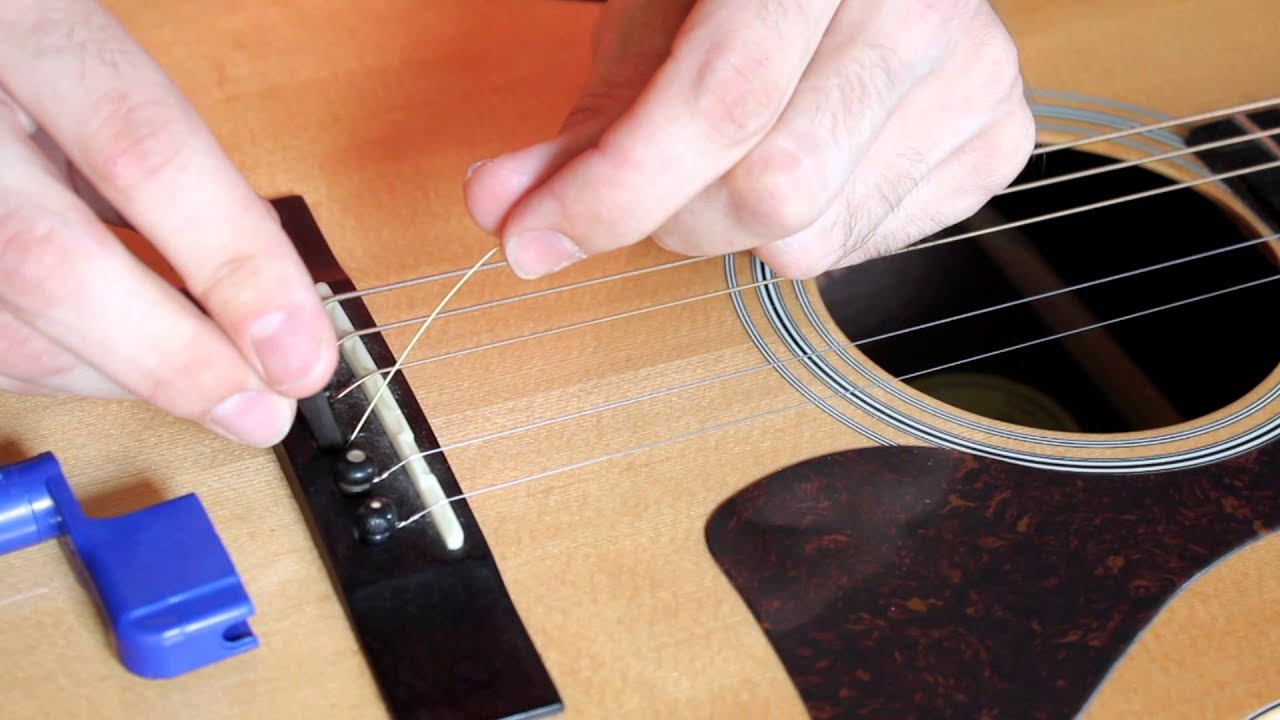 How To Change An Acoustic Guitar String Easy Youtube