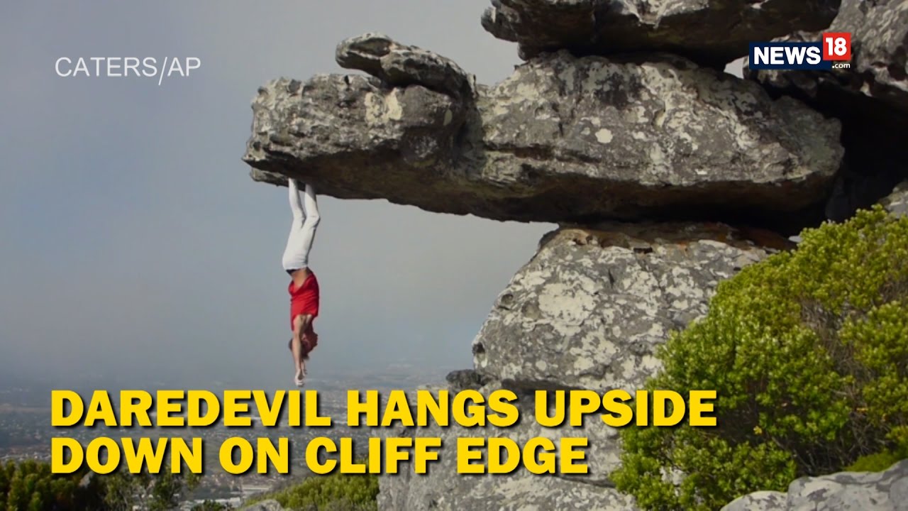 Daredevil Hangs Upside Down On Cliff Edge Youtube