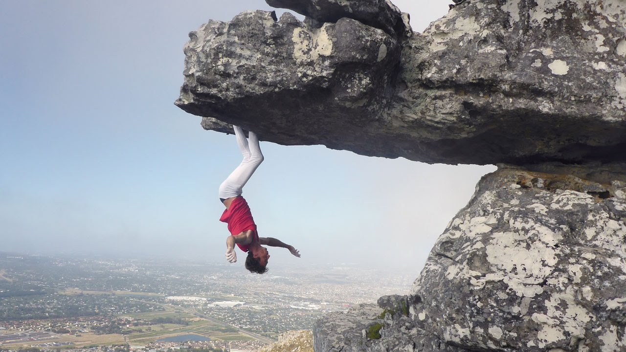 Daredevil Hangs Upside Down On Cliff Edge Youtube