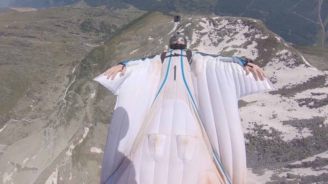 Daredevil Glides Down Mountain Side While Being Upside Down Youtube