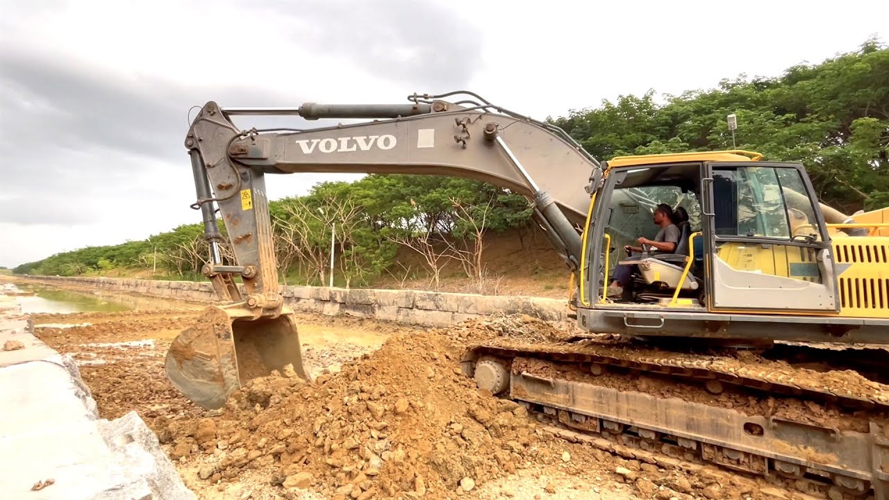 Excavator In Action Masterful Manual Digging For Construction Project
