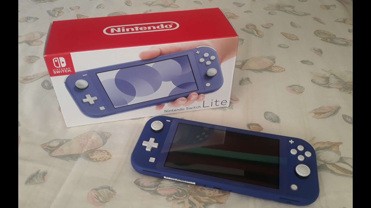 Nintendo Switch Lite Blue Unboxing Setup Youtube