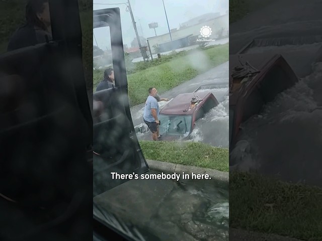 Man Risks Life To Save Truck Driver Trapped In Flooding 77e328