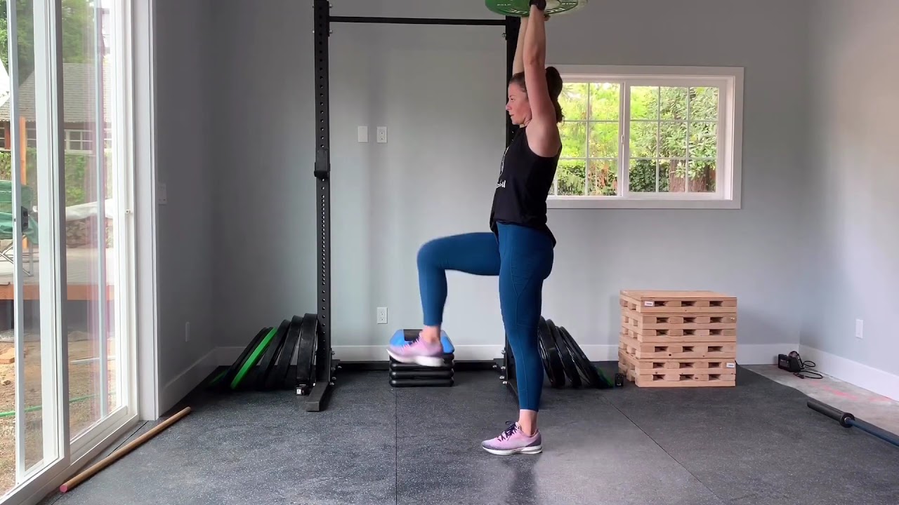 Overhead Plate Carry How To Do The Dumbbell Farmer S Walk